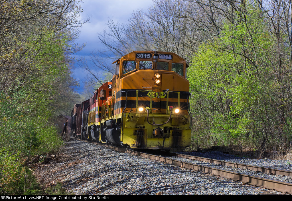 Southbound 608 just after crossing the Willimantic River with a thunderstorm behind for contrast.